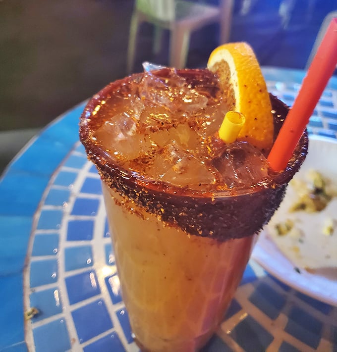 Desert thirst doesn't stand a chance against this rim-crusted concoction. That orange slice isn't just for show – it's vitamin C for the road.