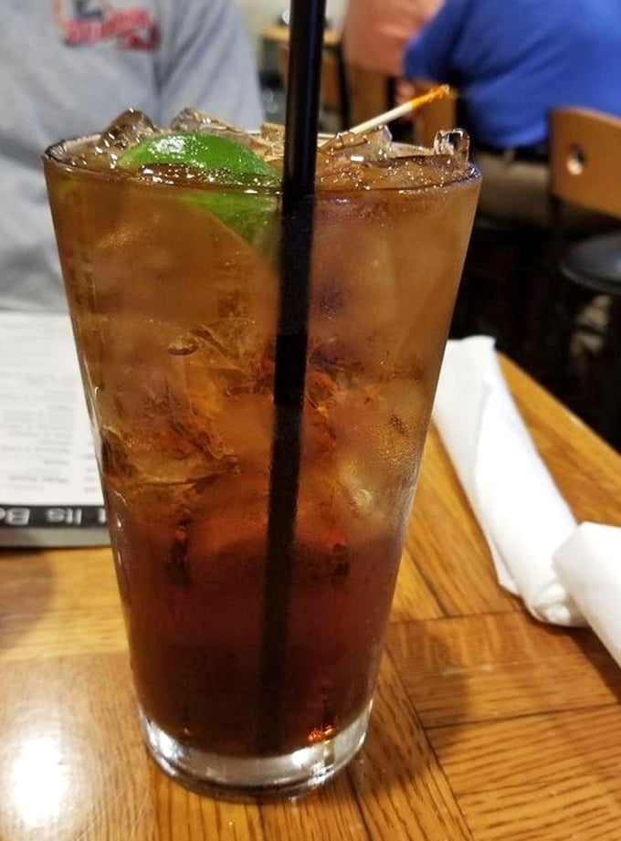 That's not just a drink—it's liquid salvation after a long day, complete with the lime wedge of hope we all need sometimes.