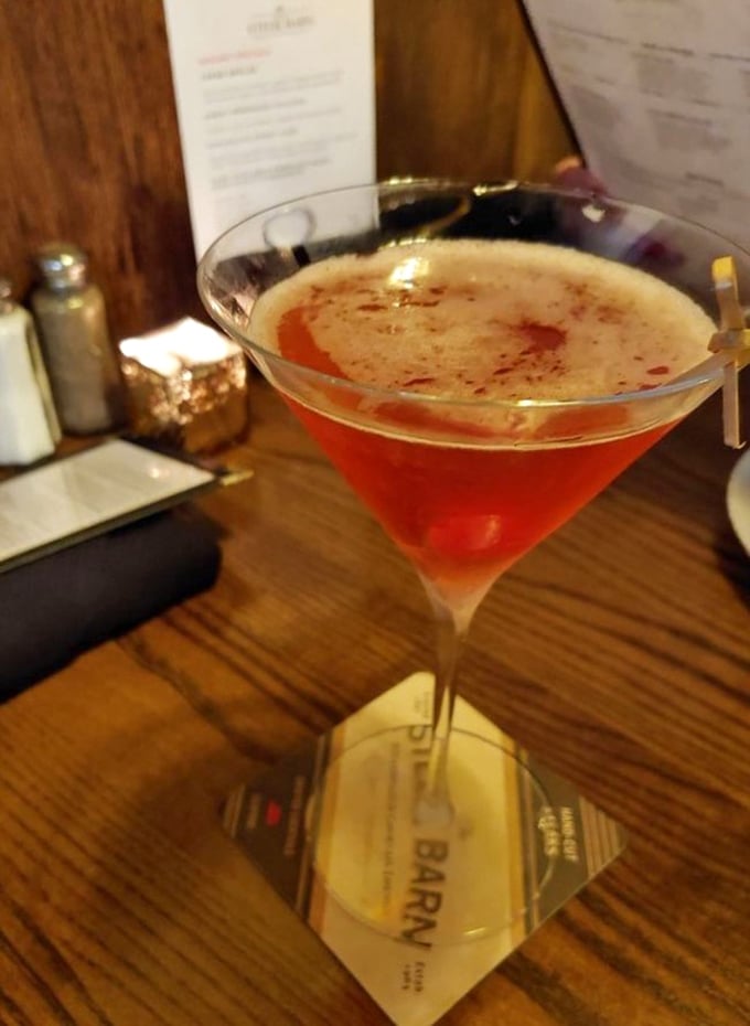 This cocktail isn't just a drink—it's liquid ruby, crafted with the kind of care usually reserved for fine jewelry.
