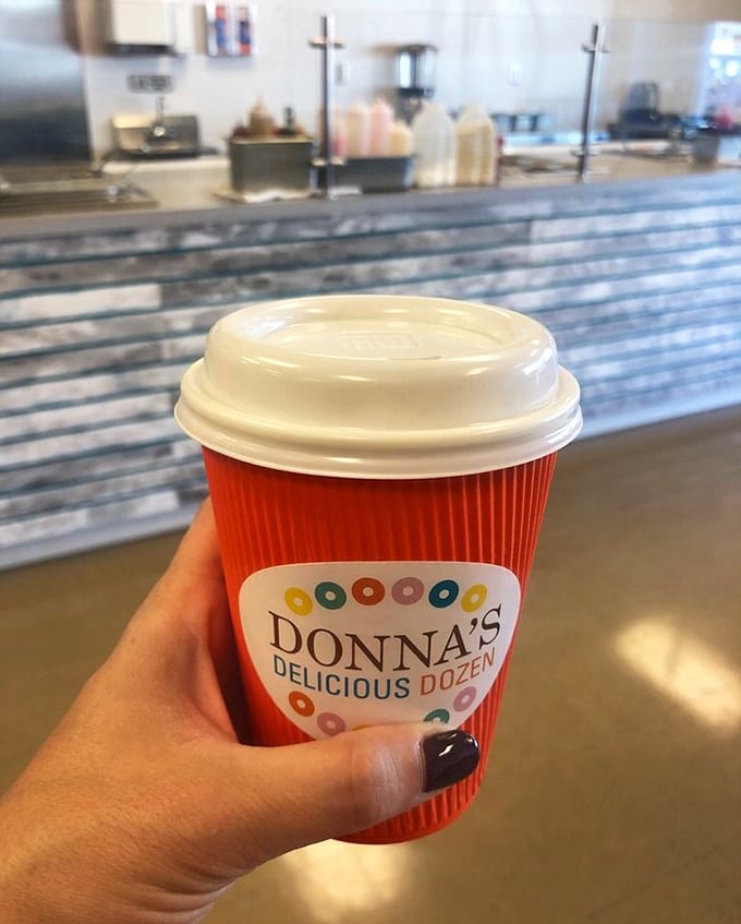 Even the coffee cups at Donna's sport the cheerful, colorful logo. The perfect companion for donut expeditions—because balance is important, right?