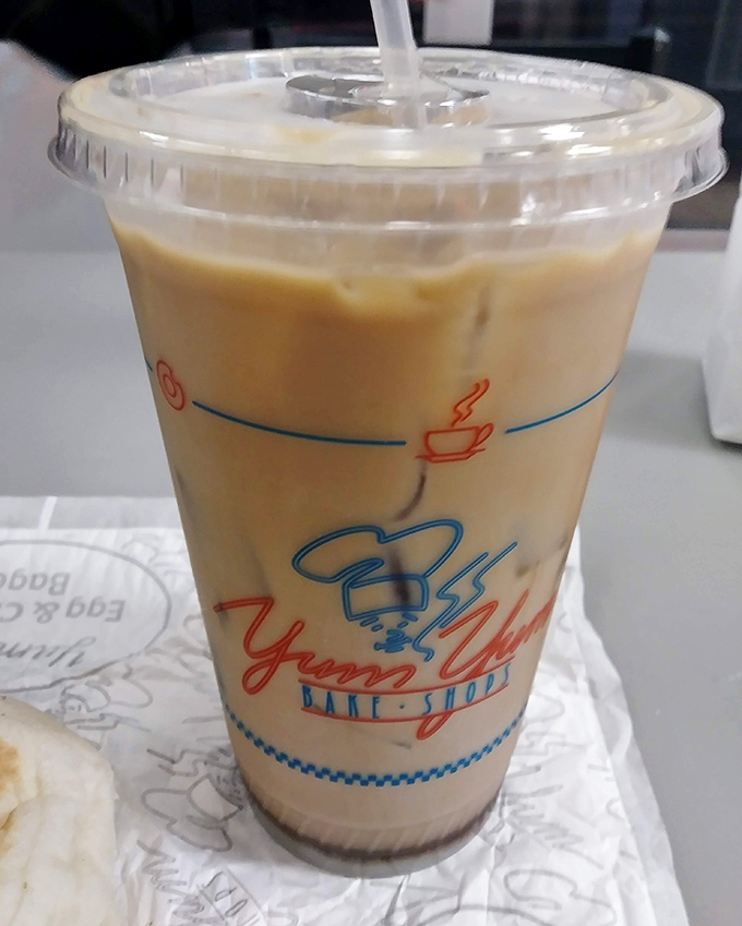 Their iced coffee comes in that perfect cup—the one that says, "Yes, you deserve this liquid happiness with your donut." 