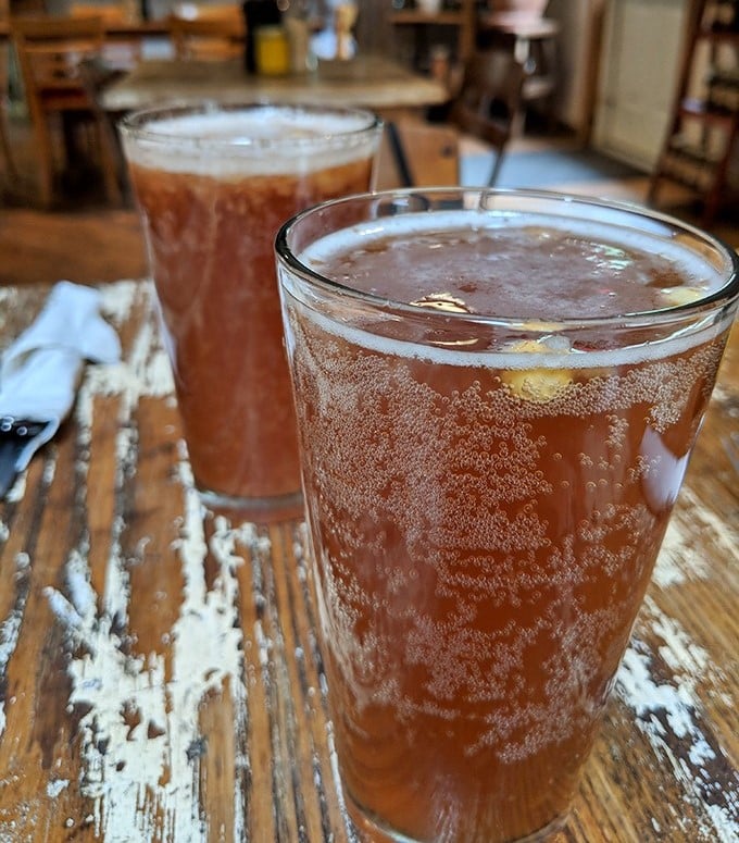 Local craft beers served in glasses that showcase their amber brilliance – liquid proof that Pennsylvania knows its brewing.