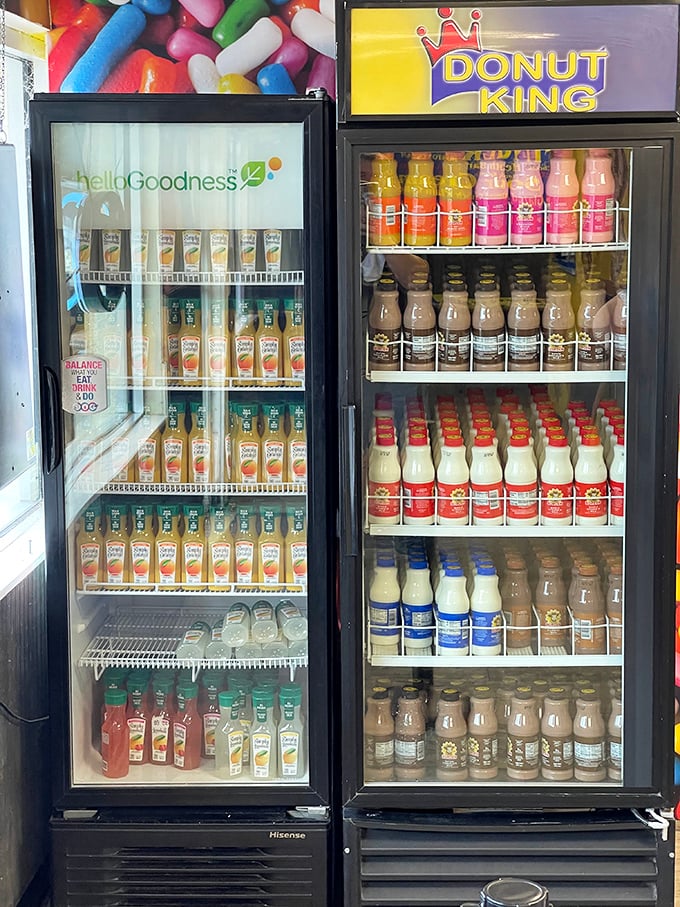 The drink coolers offer colorful refreshment options. Because washing down those donuts requires proper hydration—or chocolate milk, your call.