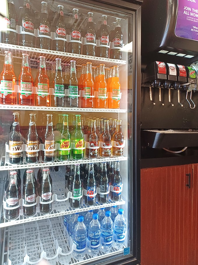 The drink cooler at Nick's—stocked with Southern favorites like Cheerwine and classic sodas. It's a time machine in refrigerator form.