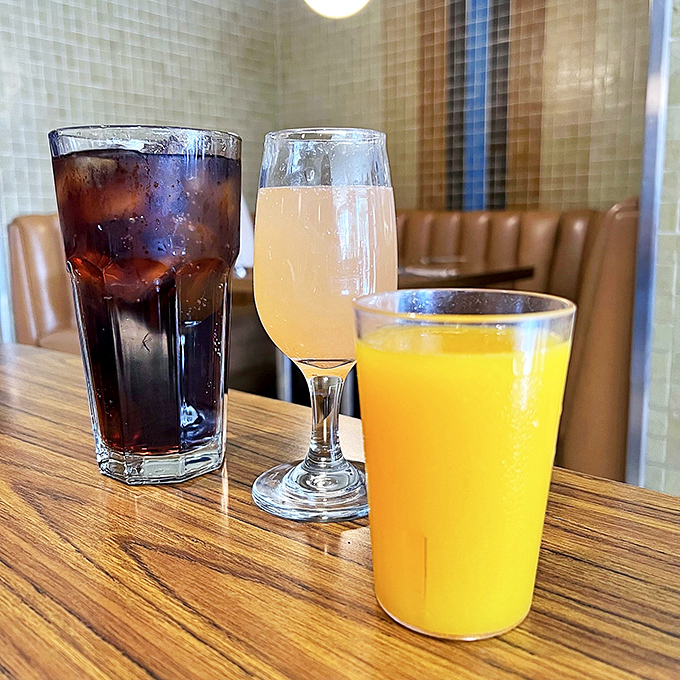 Morning libations that promise to jumpstart your day—from classic OJ that tastes like liquid sunshine to what appears to be a mimosa for champions.