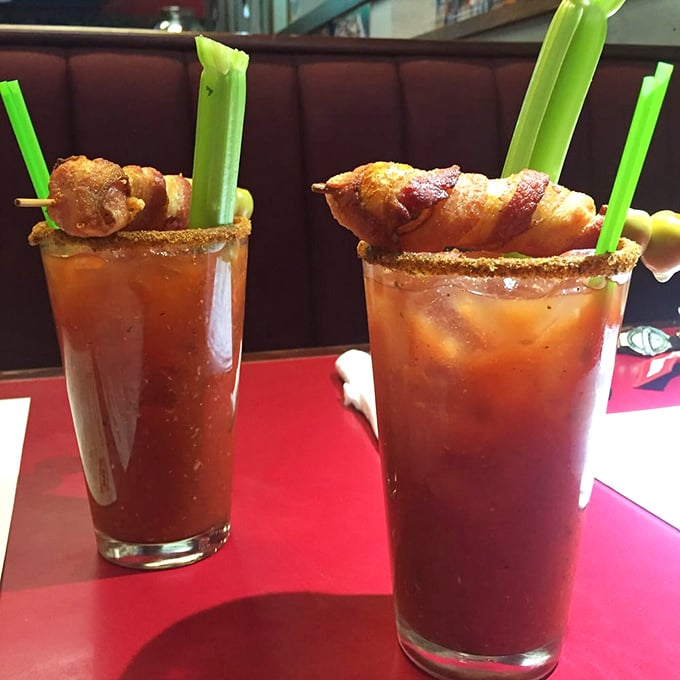 Bloody Marys garnished with bacon – because sometimes your drink deserves its own breakfast too.