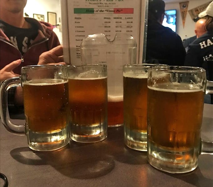 Cold beer in frosty mugs: nature's perfect companion to molten cheese and dough. Some partnerships are just meant to be.
