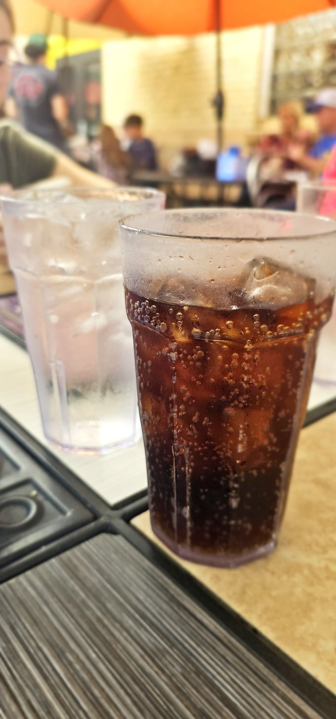 That root beer isn't just a beverage—it's a bubbly time machine that takes you back to simpler days when soda fountains were social hubs.