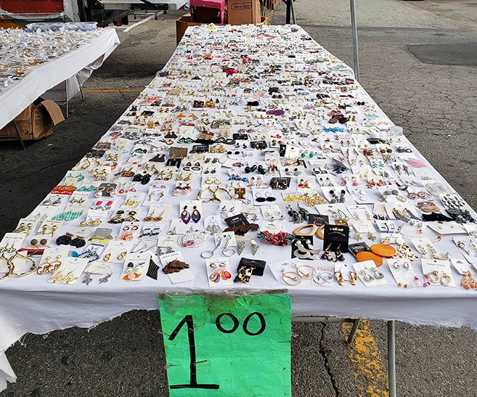 A sea of sparkle stretches across this jewelry table. One dollar buys you instant accessorizing power.
