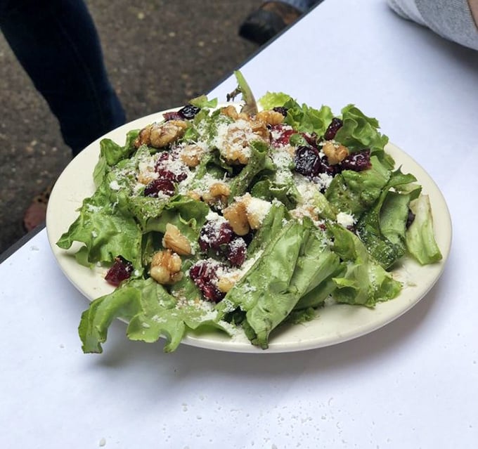 The "Big Fat Salad" lives up to its name with greens, cranberries, and walnuts—making virtue taste suspiciously like indulgence.