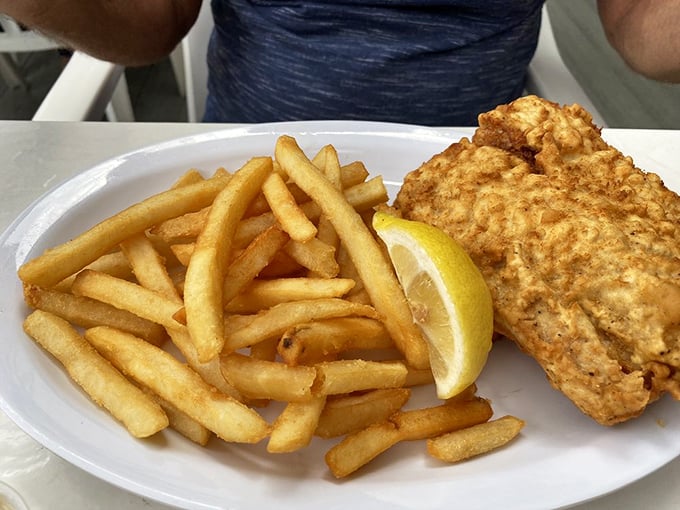 Fish and chips that would make a British pub jealous—golden batter, flaky white fish, and fries worth fighting over.