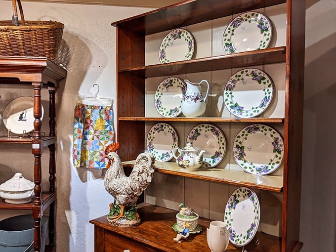 That rooster isn't just decorative—he's standing guard over a collection of china that would make any Sunday dinner feel special.