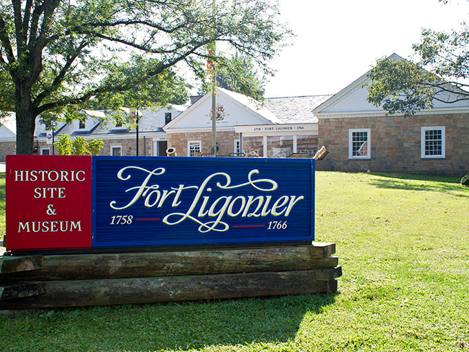 Fort Ligonier's sign stands as a portal to the 1700s, where history comes alive without the uncomfortable parts like dysentery or powdered wigs.
