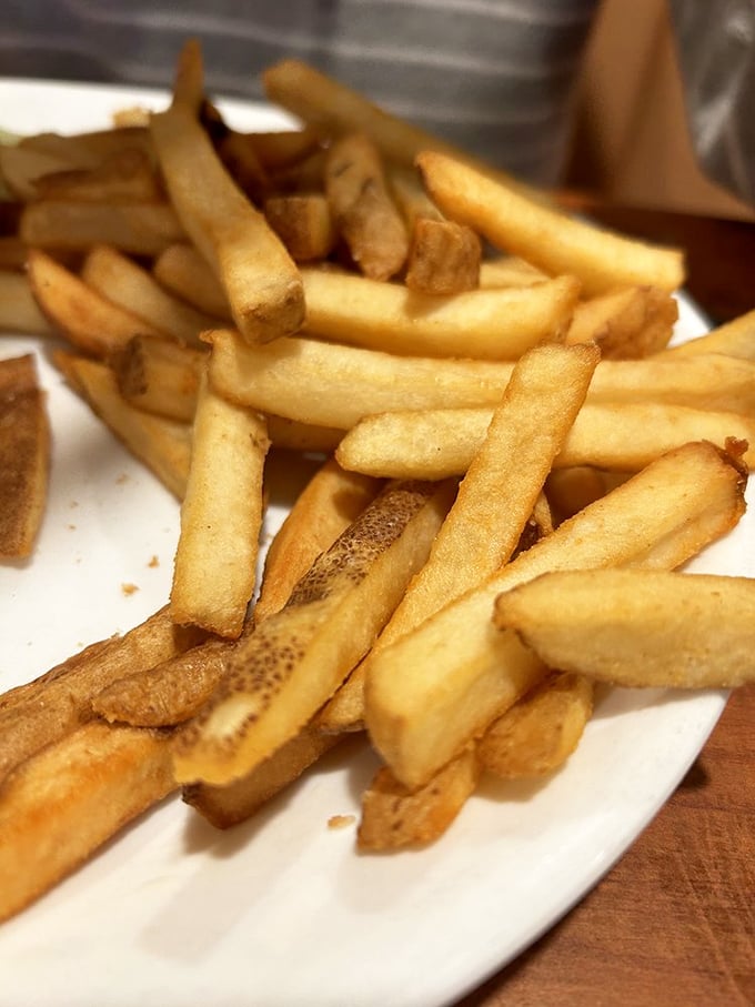 These aren't just french fries—they're golden happiness sticks with the perfect balance of crispy exterior and fluffy interior. 