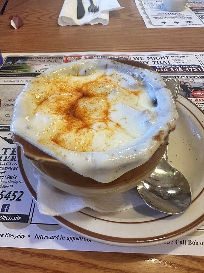 French onion soup that's achieved the perfect cheese-to-broth ratio – a warm, gooey masterpiece that's worth the inevitable chin dribble.