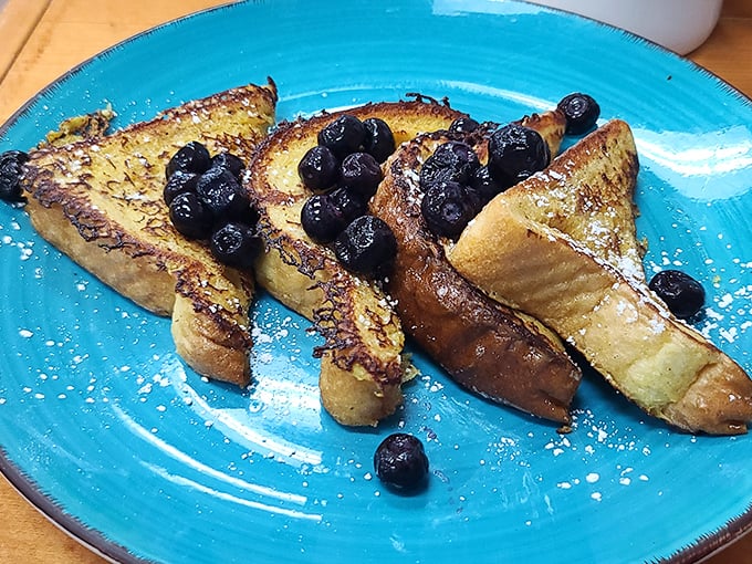 French toast that's dressed for success with fresh blueberries—breakfast's answer to "Why can't every morning feel this special?"