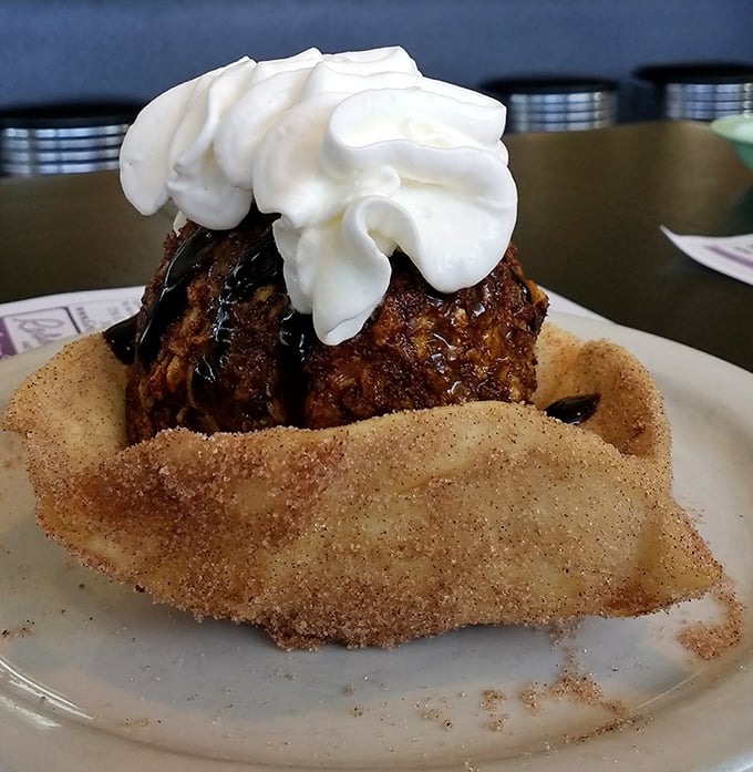 Fried ice cream that defies physics—hot, crispy shell protecting cold, creamy sweetness. Science never tasted so indulgent.