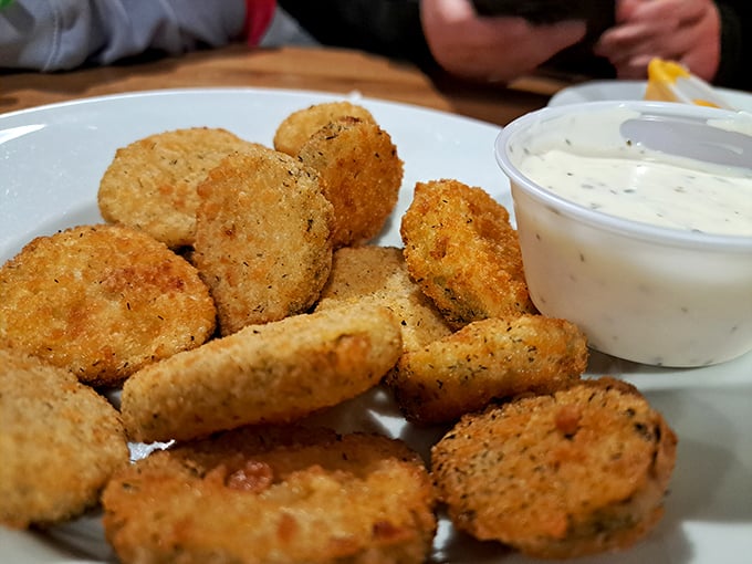 Fried pickles that deliver that perfect crunch-to-tang ratio – the unsung heroes of any proper pizza feast.