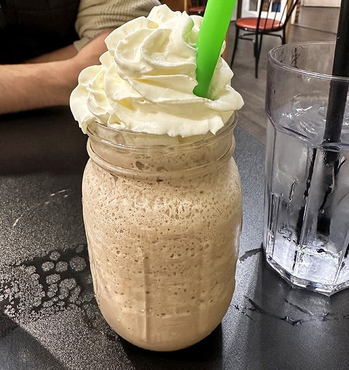 Their milkshakes don't just bring folks to the yard—they inspire pilgrimages across county lines for that cloud of whipped cream perfection.