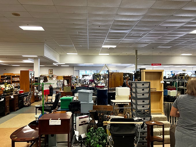 The furniture section—where that perfect side table you never knew you needed patiently waits among the wooden warriors.