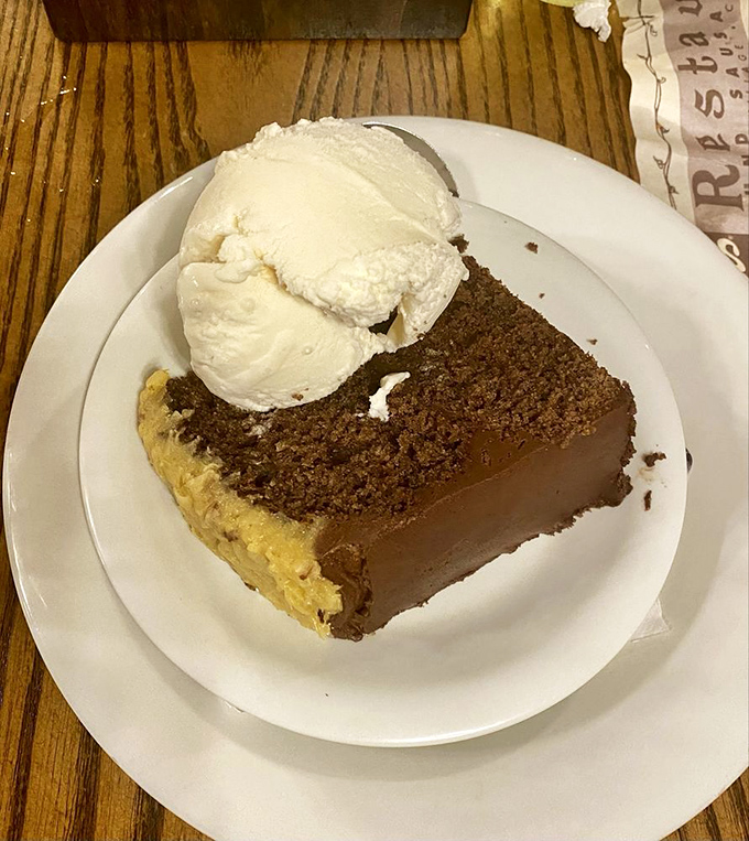 German chocolate cake with a mountain of whipped cream—because sometimes dessert should be taller than your coffee cup.