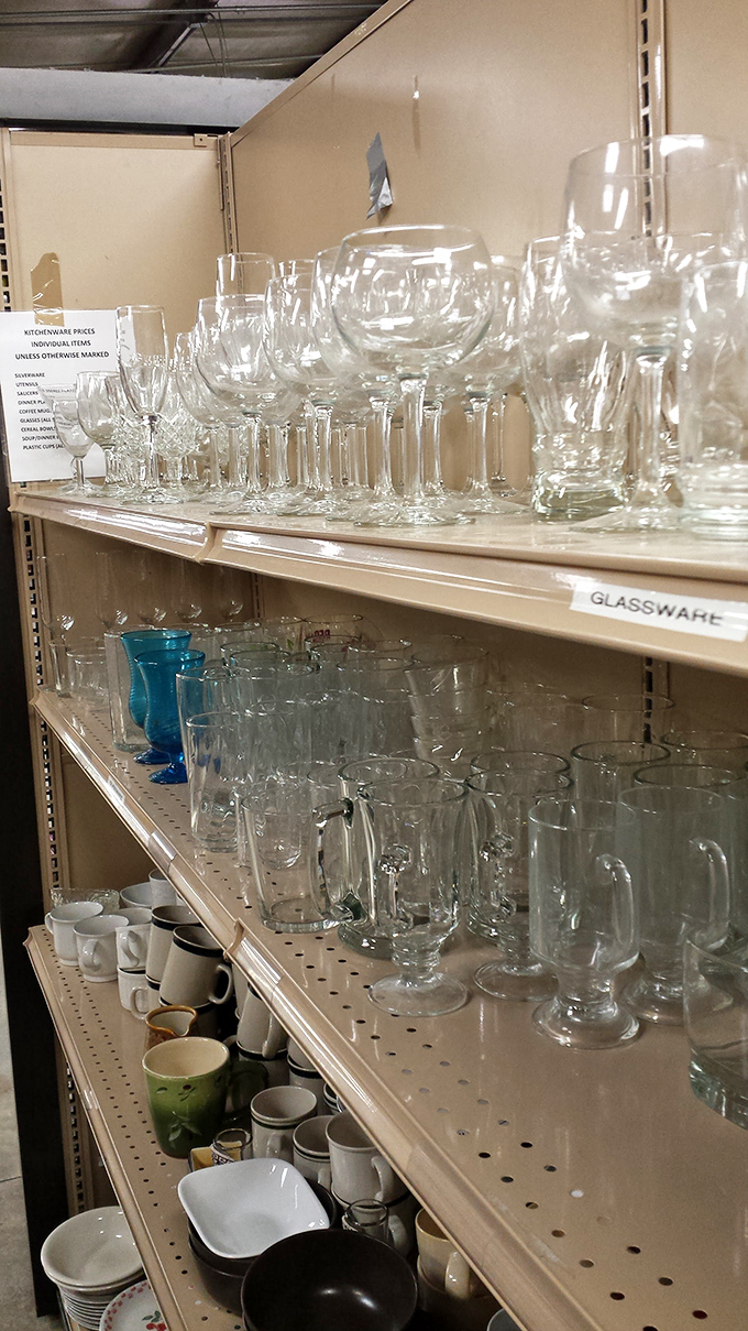 Glassware that survived decades of dinner parties stands ready for your next gathering. That blue goblet is practically screaming "buy me!"
