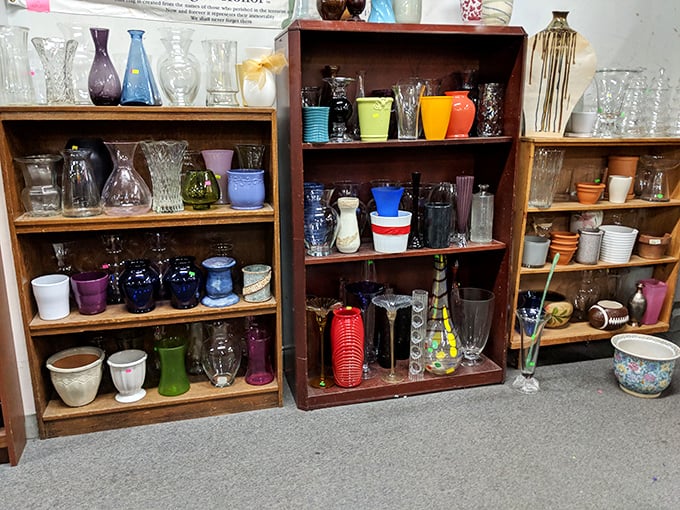 Crystal, colored glass, and vintage vessels line these wooden shelves – each with stories to tell from dinner parties of decades past.