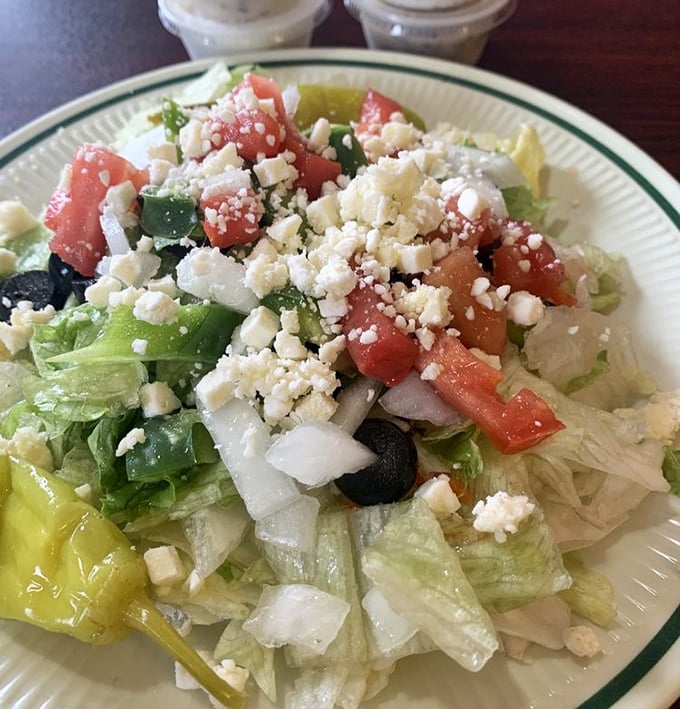 A Greek salad that brings fresh, crisp relief to a menu of hearty options. Those feta crumbles aren't just cheese—they're little flavor bombs waiting to detonate.