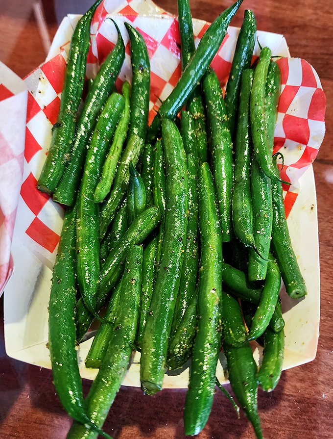 Green beans that haven't been cooked into submission – a refreshing counterpoint to the meat parade. Your mother would approve of this vegetable choice.