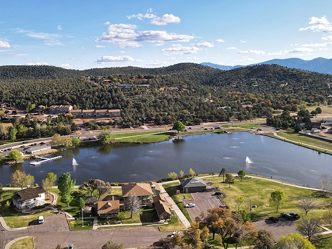 Green Valley Lake reflects the surrounding mountains like nature's own Instagram filter—no hashtags or followers required.