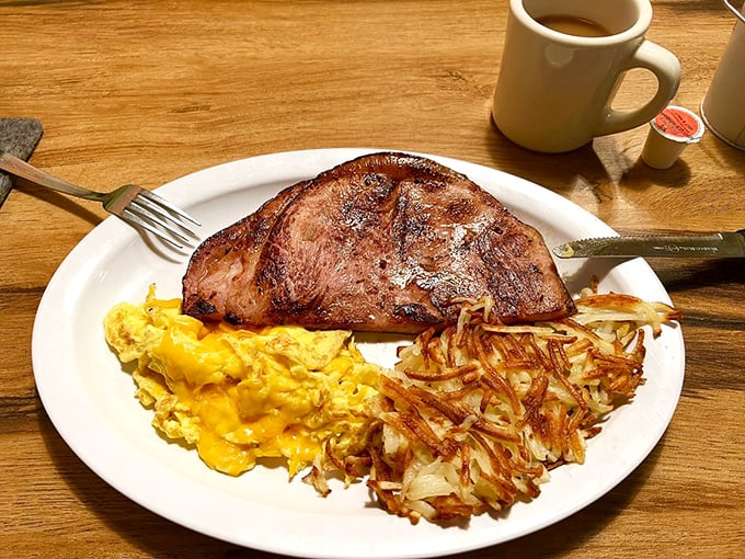 This pork chop with eggs and hash browns isn't just breakfast – it's a declaration that today is going to be an excellent day.
