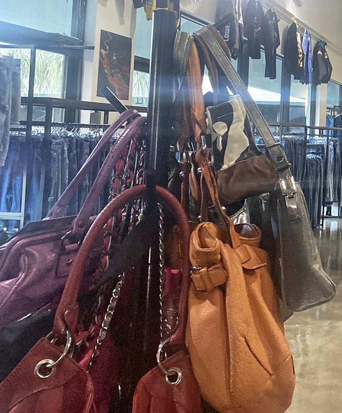 Handbag heaven hanging in plain sight – designer dreams at prices that won't require explaining mysterious charges to your spouse.