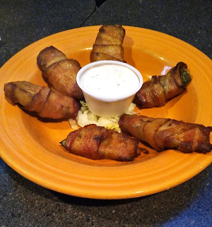 Jalapeño poppers wrapped in bacon – because sometimes vegetables need to dress up fancy to get the attention they deserve.