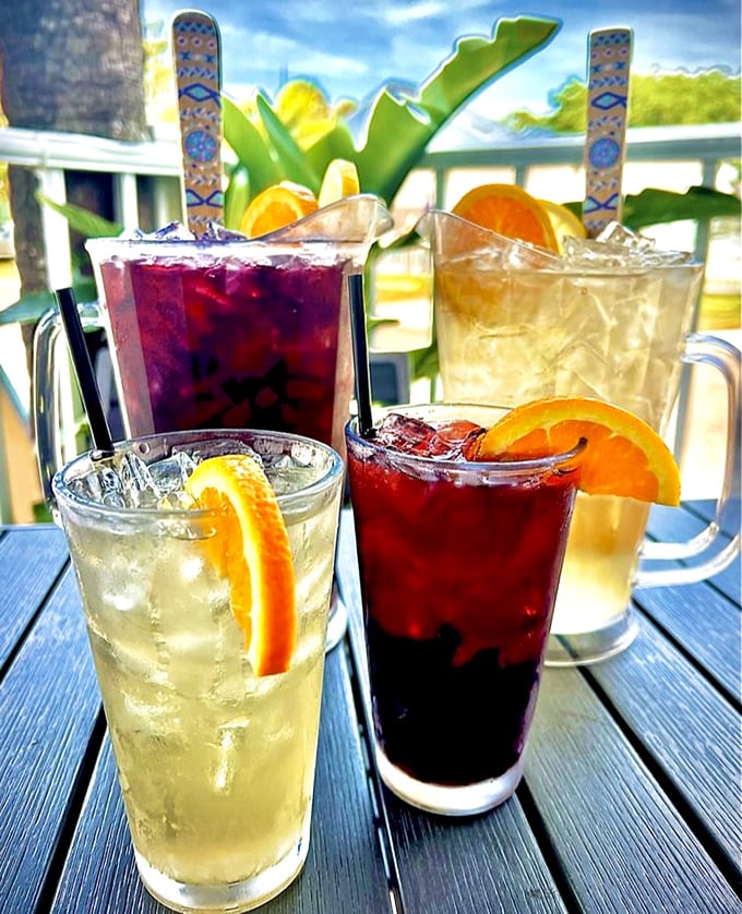 Colorful sangria and citrus-garnished cocktails that taste like vacation in a glass – liquid sunshine to complement your seafood feast.
