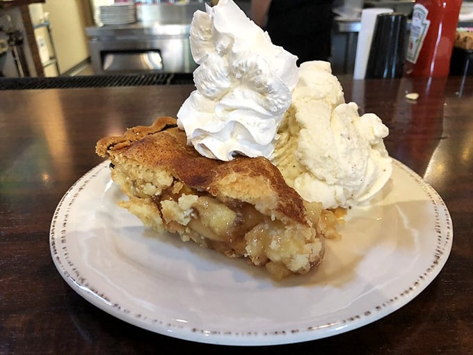 Apple pie that makes you understand why people commit pie theft. That scoop of vanilla ice cream isn't optional—it's completing a sacred covenant.