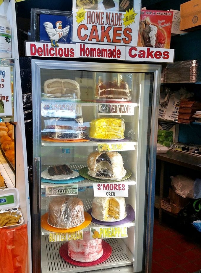 The dessert case at V's proves they're overachievers – as if mastering chicken wasn't enough. That S'mores cake is calling my name louder than my high school crush never did.