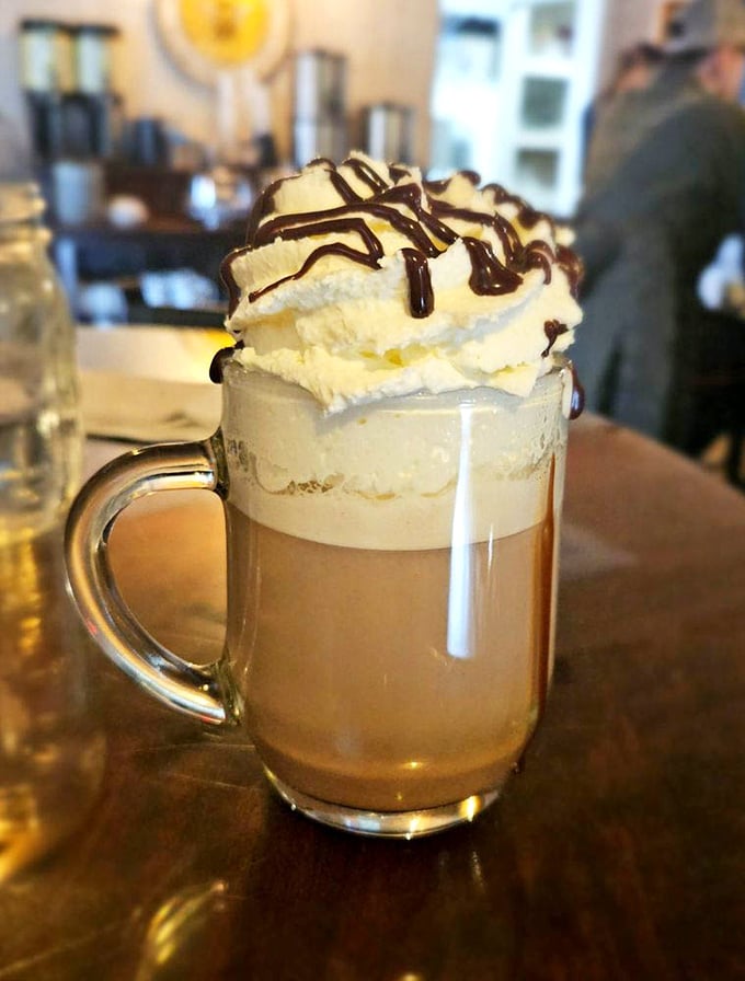 Hot chocolate that's wearing a tuxedo – whipped cream piled high with chocolate drizzle that makes you wonder why anyone drinks the powdered stuff.