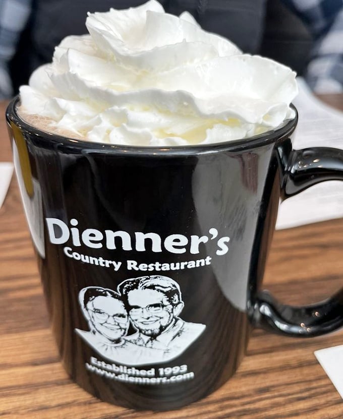 Coffee topped with whipped cream mountains that would make the Alps feel inadequate – pure liquid happiness.
