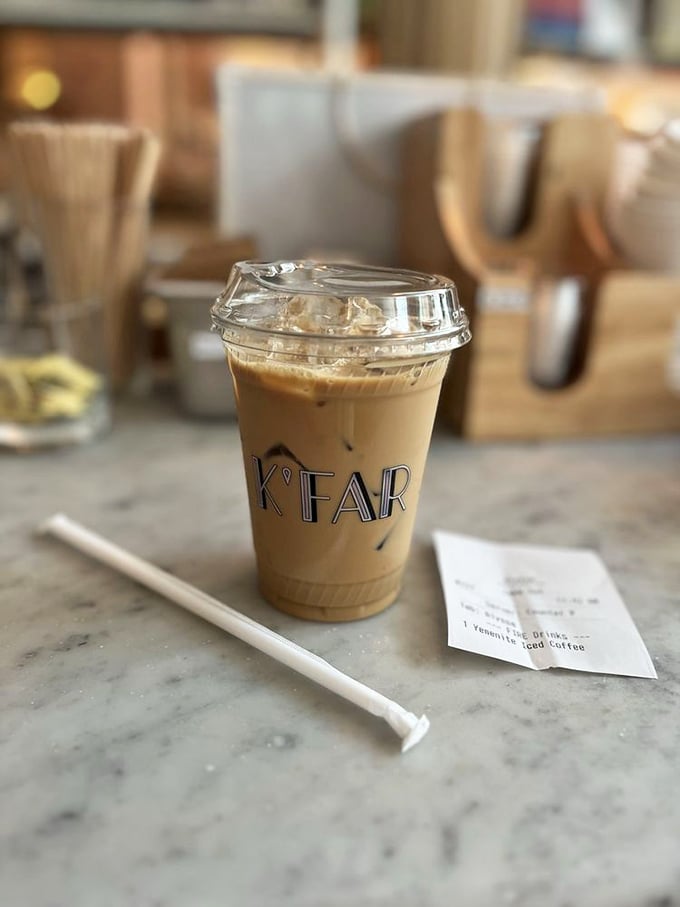 Even their iced coffee gets the special treatment, served in a branded cup that promises (and delivers) a caffeine experience worthy of its stylish surroundings.