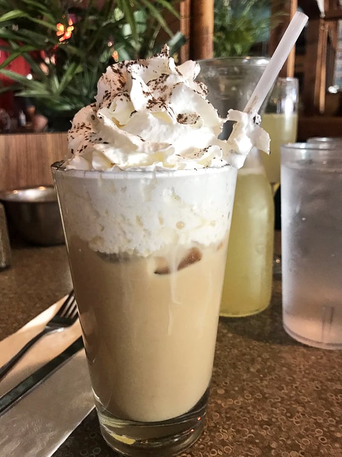 An Irish coffee topped with enough whipped cream to make St. Patrick himself blush—dessert and caffeine joining forces for the greater good.
