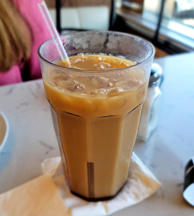 Iced coffee: the elixir that powers Pennsylvania through humid summers and Monday mornings. This glass contains approximately 47% of your daily will to live.