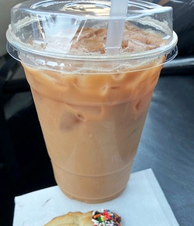 Their iced coffee doesn't just wake you up—it makes you thankful to be awake, with a tiny cookie surprise on the side.