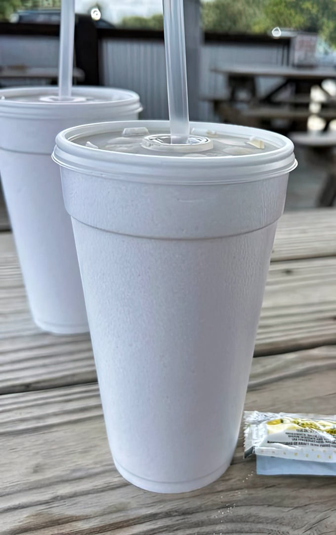 Sweet tea in Georgia isn't just a beverage, it's practically a constitutional right – served properly in a styrofoam chalice of Southern hospitality.