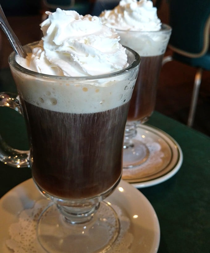 Irish coffee topped with a cloud of whipped cream—proof that sometimes the best morning motivation comes with a gentle whisper of whiskey.