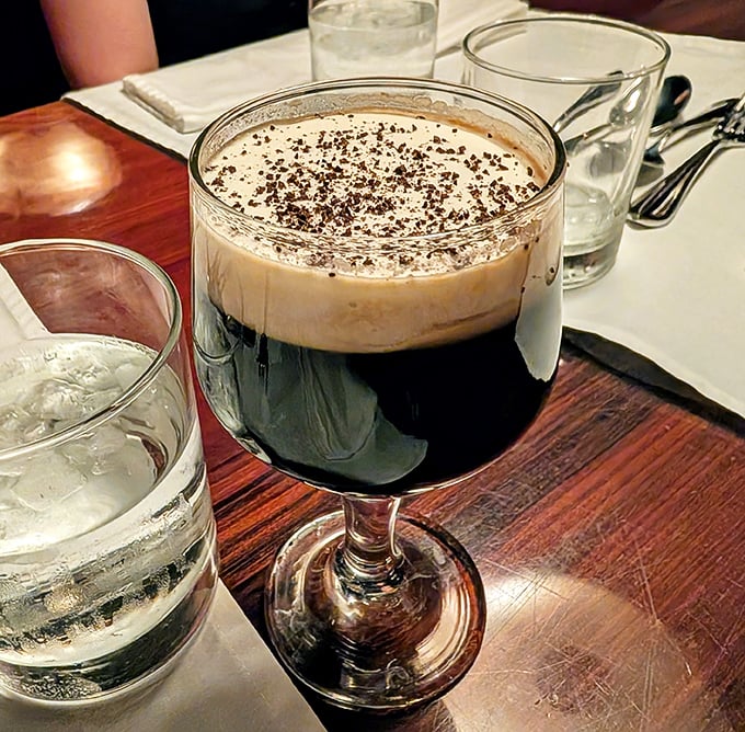 This isn't just coffee—it's a layered Irish masterpiece in glass, the perfect nightcap after conquering a porterhouse. Cream, coffee, whiskey—the holy trinity.