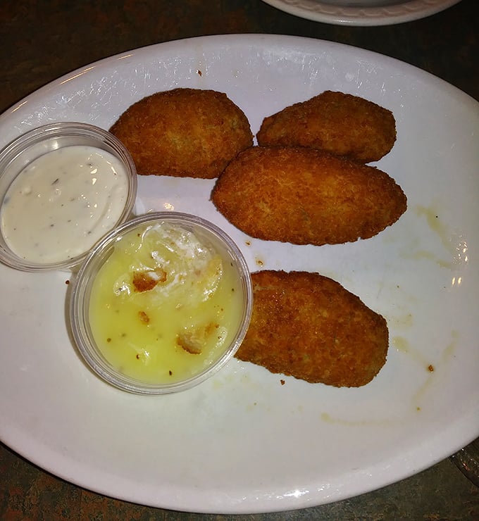 These golden-brown jalapeño poppers aren't just appetizers; they're little capsules of joy that make waiting for your main course a pleasure, not a chore.