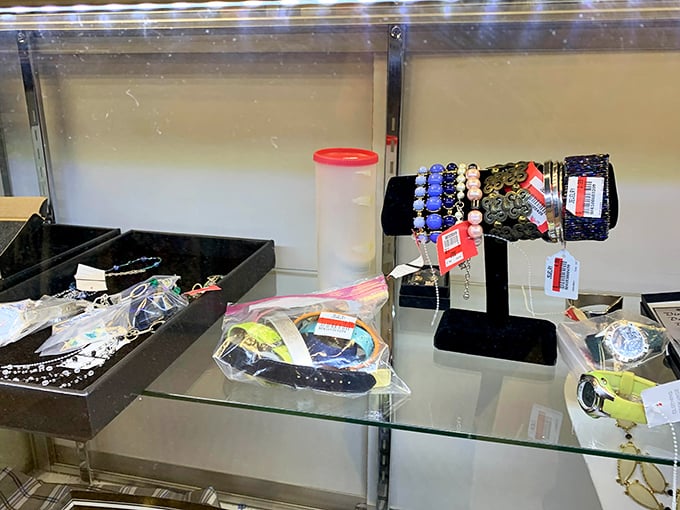Jewelry display cases—where someone's forgotten accessories await their next adventure on a new wrist or neckline.
