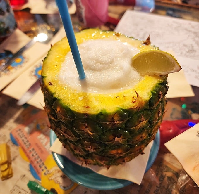 When your drink arrives in an actual pineapple, you know you're not in Kansas anymore – tropical paradise achieved.