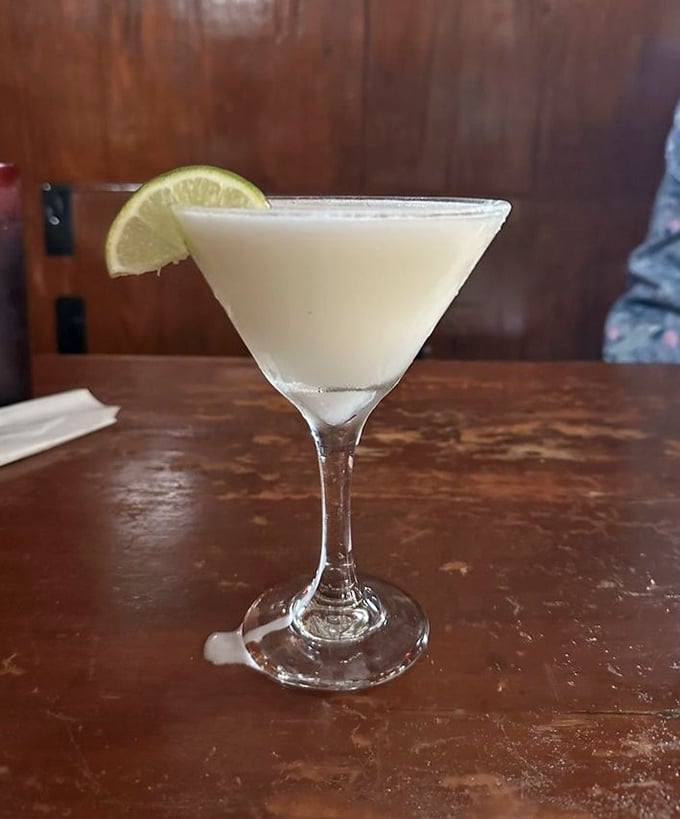 The Key Lime Martini – where dessert meets cocktail hour in a glass that promises vacation vibes with every sip.