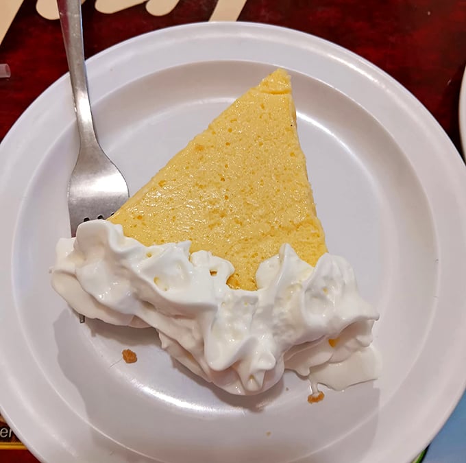 Key lime pie with clouds of whipped cream—Florida's signature dessert that makes you wonder why chocolate gets all the attention.
